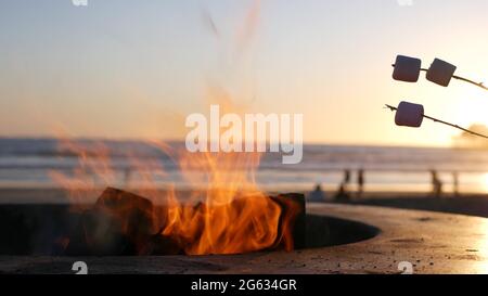 Campfire pit by Oceanside pier, California USA. Camp fire on ocean ...