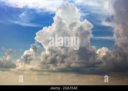 huge storm cloud, tower cumulus and cumulonimbus cloud Stock Photo - Alamy