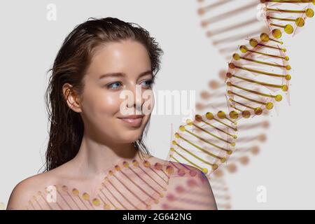 DNA stems and beautiful female face in double exposure over blue ...