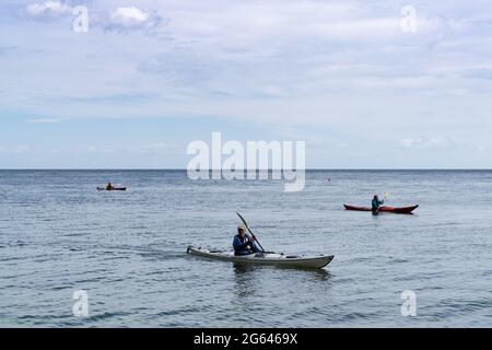 Hojerup, Denmark - 12 June, 2021: group of sea kayakers paddling off ...
