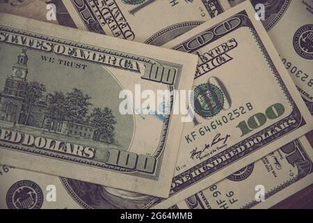 Flat lay American cash banknotes 50 dollar and 100 dollar bills marked ...