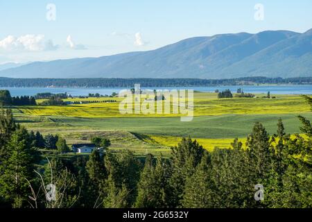 The southern edge of Flathead Lake near Polson, Montana is seen from an ...