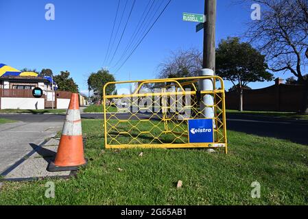 A damaged Telstra communication pillar awaiting maintenance Stock Photo ...