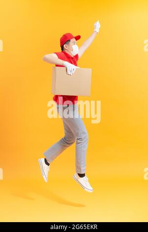 Running with a parcel Courier Stock Photo - Alamy