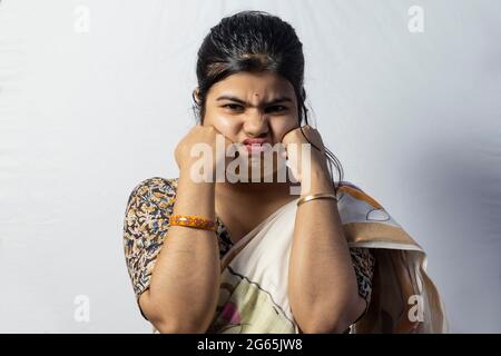 An Indian lady with an angry face expression Stock Photo - Alamy