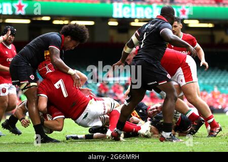 Wales' Elliot Dee (hidden) scores their side's fourth try during the ...