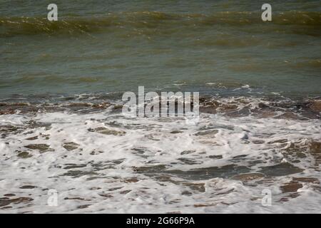White Spume Known as Sea, Ocean or Beach Foam Created by the Agitation ...