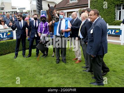Ryan Moore (third left) and connections after winning the Queen Mary ...