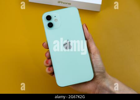 iPhone 12 in green color Stock Photo - Alamy