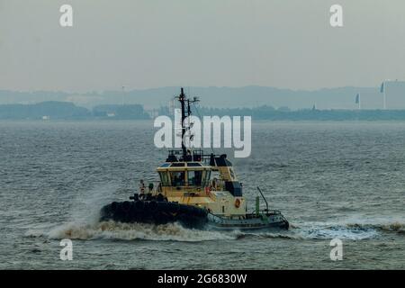 Tug Svitzer Moira heading out to meet container vessel MSC Hong Kong V ...