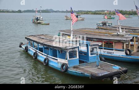 Terengganu, Malaysia: Sept 13, 2014 - A fisherman on his small boat ...