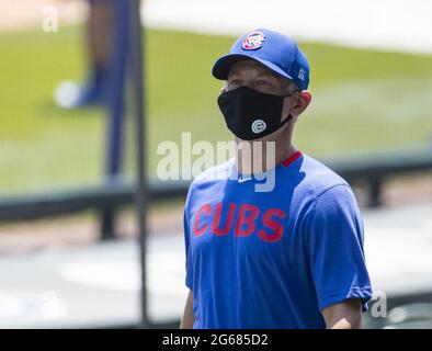 Chicago Cubs general manager Jed Hoyer talks on the phone during team's ...