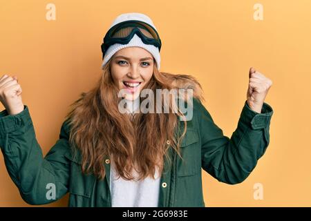 screaming girl in hat and coat with bouquet of poppies in her hands in ...