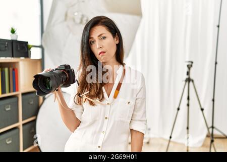 Sleep equipment concept. Portrait of brunette woman sleeping on floor ...