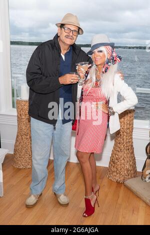 attend the July 3rd Patriotic Sunset Soiree at a private residence in ...