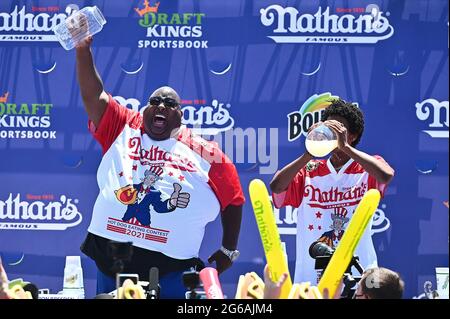 Eric “Badlands” Booker (c) celebrates as he wines the “Chug ...