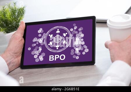 Tablet screen displaying a bpo concept Stock Photo - Alamy