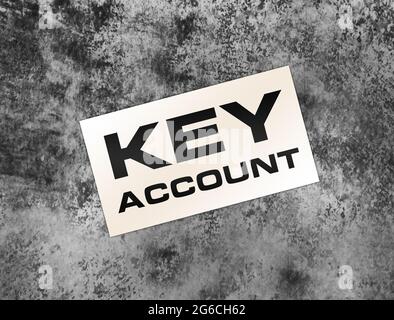 blank card with text KEY ACCOUNT on wooden background. Business concept ...