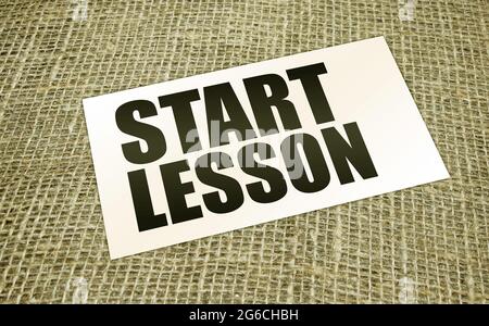 Start lesson words on card on wooden table. Education concept Stock ...