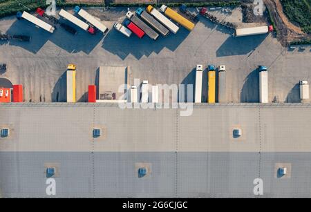 Top view of semi trucks waiting for loading at parking lot at logistic ...