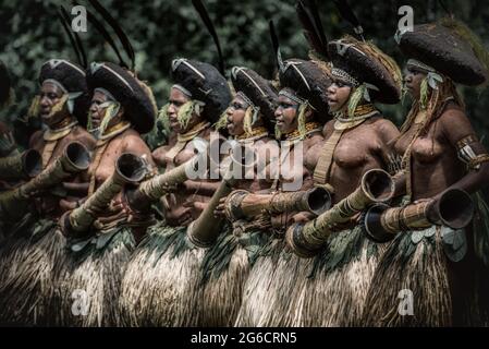 The Mudmen of Papua New Guinea are those who wear a traditional costume ...