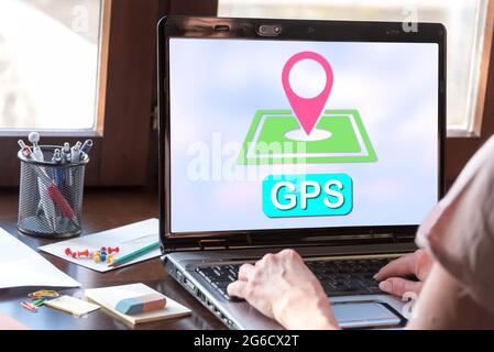 Laptop screen displaying a gps concept Stock Photo - Alamy