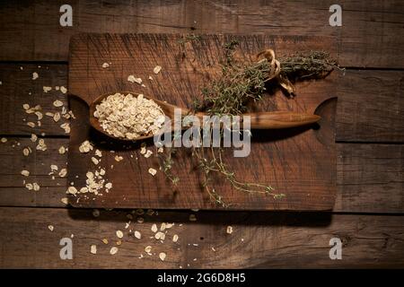 Composition with oatmeal flakes on wooden table, top view Stock Photo ...