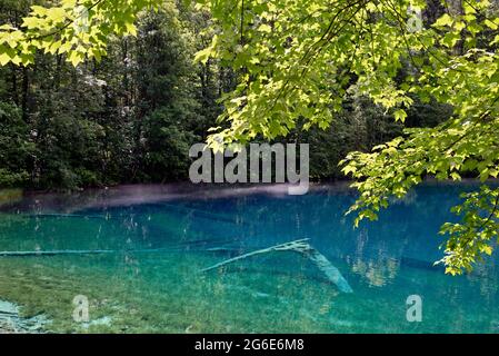Mountain lake, Christlessee, clouds of mist drift over the clear ...