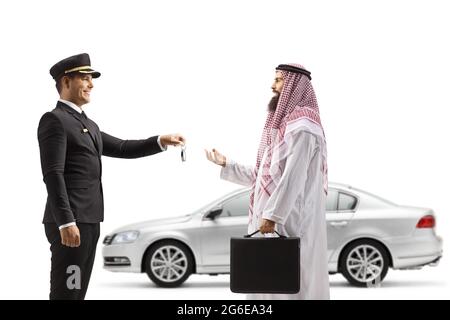 Saudi arab man holding car keys and smiling isolated on white ...