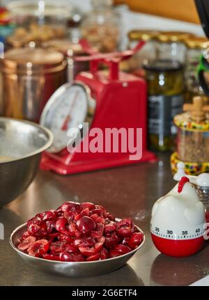 Pitted cherries are ready in pie bowl. Step by step recipe Stock Photo ...