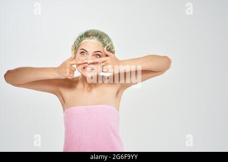 beautiful woman shower cap acne on the face dermatology Stock Photo - Alamy