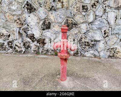 An old typical industrial metal chain link fence and post Stock Photo ...