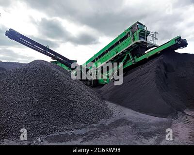 Coal Loading Conveyor Belt and a Pile of Coal at a Coal Mine Stock ...
