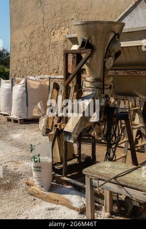 Traditional salt factory. Packaged salt ready to distribute Stock Photo ...