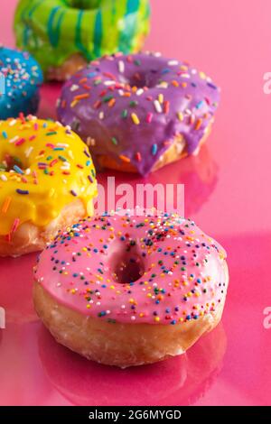 Rainbow donuts with icing Stock Photo - Alamy