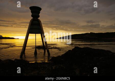 The Time and Tide Bell (St Patrick's Bell) on the beach in Cemaes Bay ...