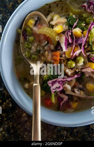 Red cabbage soup with peas and carrots Stock Photo - Alamy