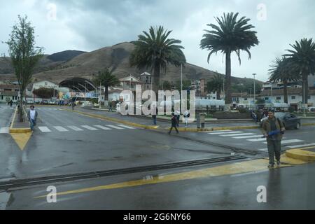 Raining in the Republic of Peru wet trees mountain hill child people ...
