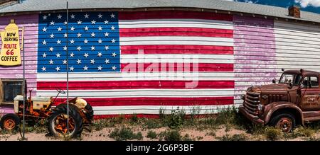 Red antique firetruck with American flag in Ridgeway Colorado Stock ...