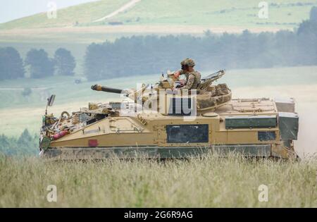 british army FV510 Warrior light infantry fighting vehicle and an army ...