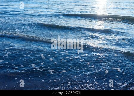 Areal shot of deep blue and rough sea with lot of sea spray.Blue ...