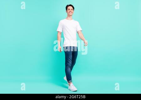Full body photo of millennial funky brunette guy jump with ball wear ...