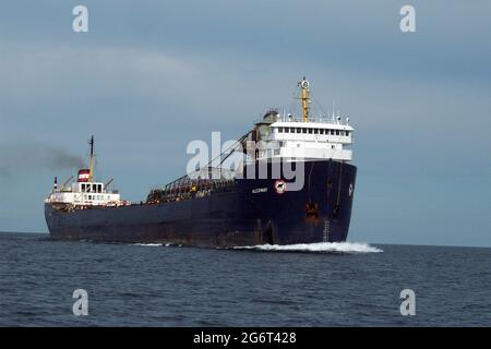 Large Great Lakes Freighter passing under Mackinac Bridge, one of the ...