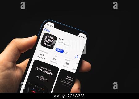 Kharkov, Ukraine - June 4, 2021: NHL app, man hold mobile phone with ...
