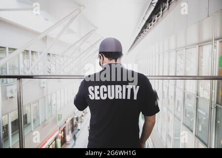 Security Guard Walking Building Perimeter With Flashlight At Night ...