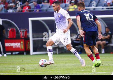Orlando City defender Kyle Smith, right, defender Alex Freeman, center ...