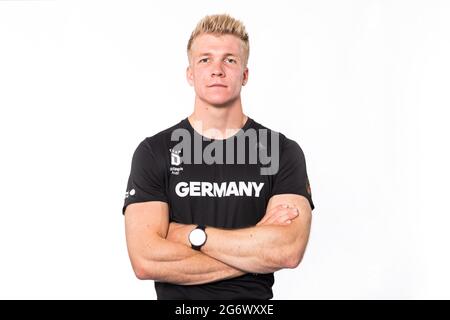 Potsdam, Germany. 20th May, 2020. Canoeist Jacob Schopf gestures at the ...