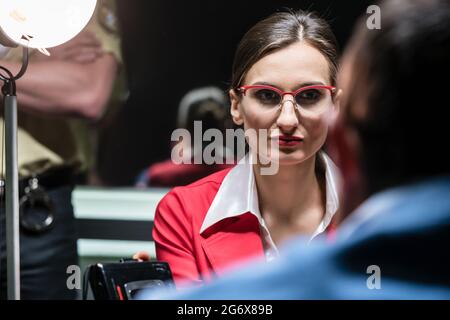 Police detective recording the statement of a suspect during the Stock ...