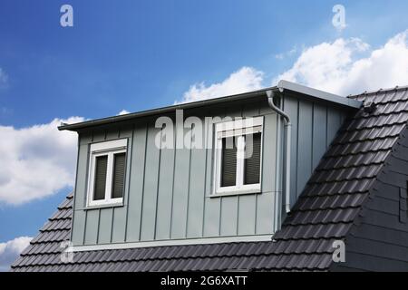 Roof dormer with stainless steel cladding Stock Photo - Alamy
