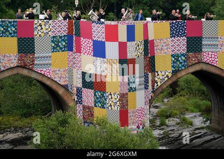 The Ifton Colliery Band play by artist Luke Jerram's new artwork ...